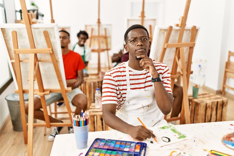 Young African Man at Art Studio Serious Face Thinking about Question ...