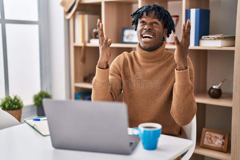 Young African Man with Dreadlocks Working Using Computer Laptop Crazy ...