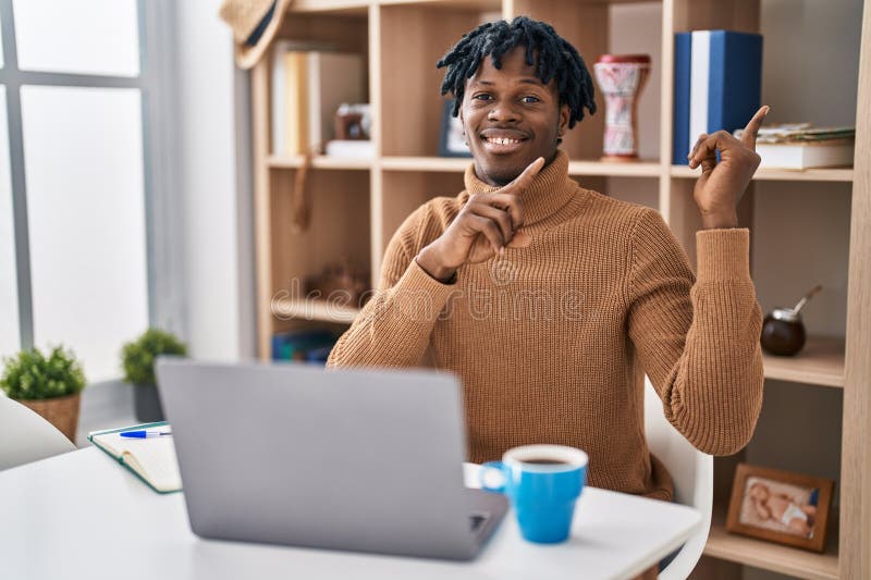Young African Man with Dreadlocks Working Using Computer Laptop Smiling ...