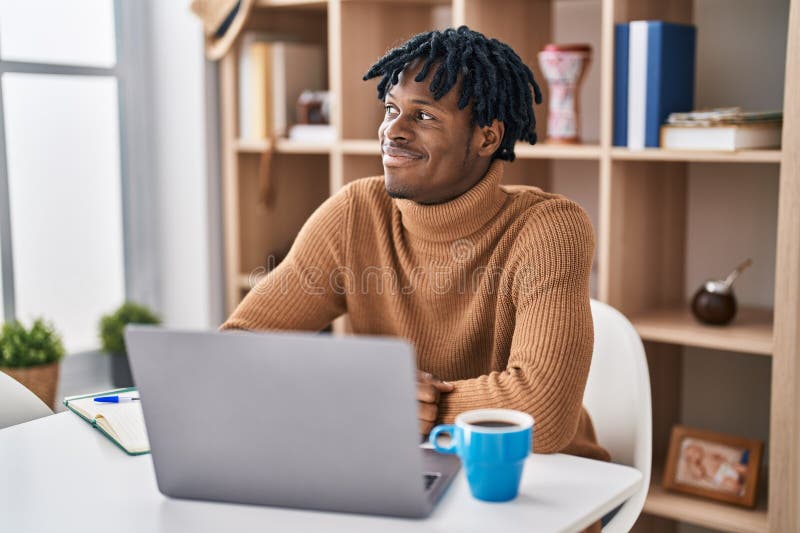Young African Man with Dreadlocks Working Using Computer Laptop Smiling ...