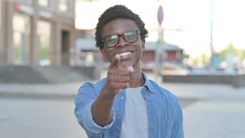 Young African Man Pointing at the Camera Outdoor Stock Image - Image of ...