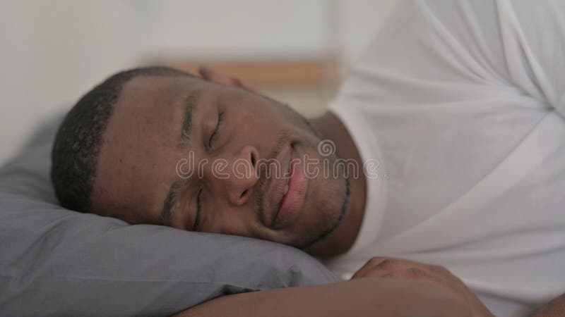 African Man Sleeping in Bed Peacefully Stock Image - Image of ...