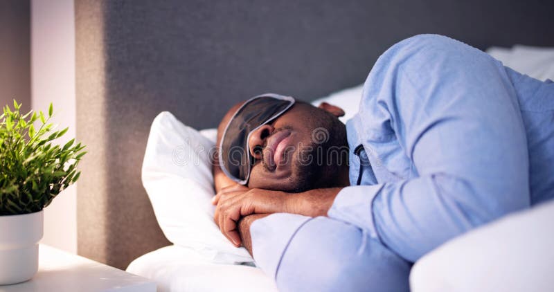 Young African Man Sleeping stock photo. Image of blindfold - 279273954