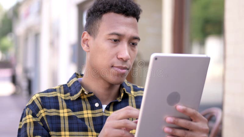 The Young African Man Using Tablet Outdoor Stock Photo - Image of adult ...