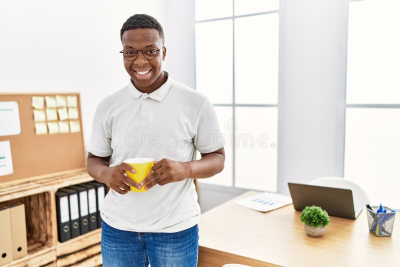 Young African Man Working Drinking a Coffee at Business Office Stock ...