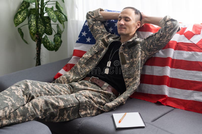Young American Soldier Sitting and Taking Notes. Stock Image - Image of ...