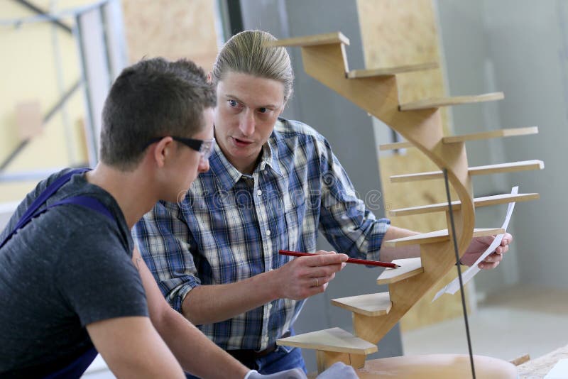 Young Apprentice with Carpentry Instructor Stock Photo - Image of ...