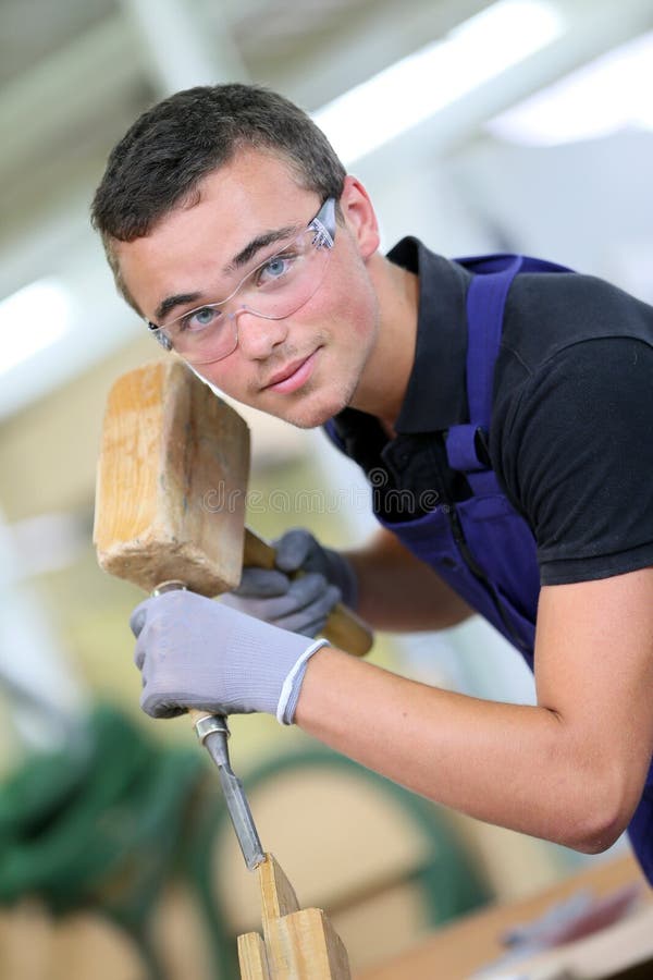 Young Apprentice in Carpentry Workshop Stock Photo - Image of ...