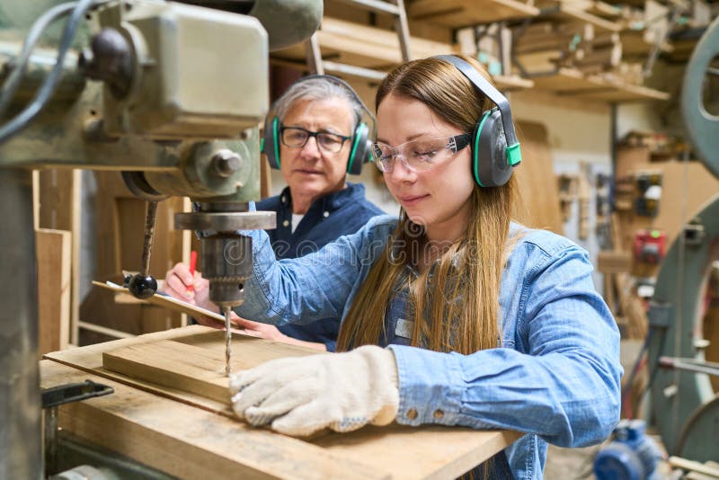 Young Apprentice Mentor Working Together Lumberyard Stock Photos - Free ...