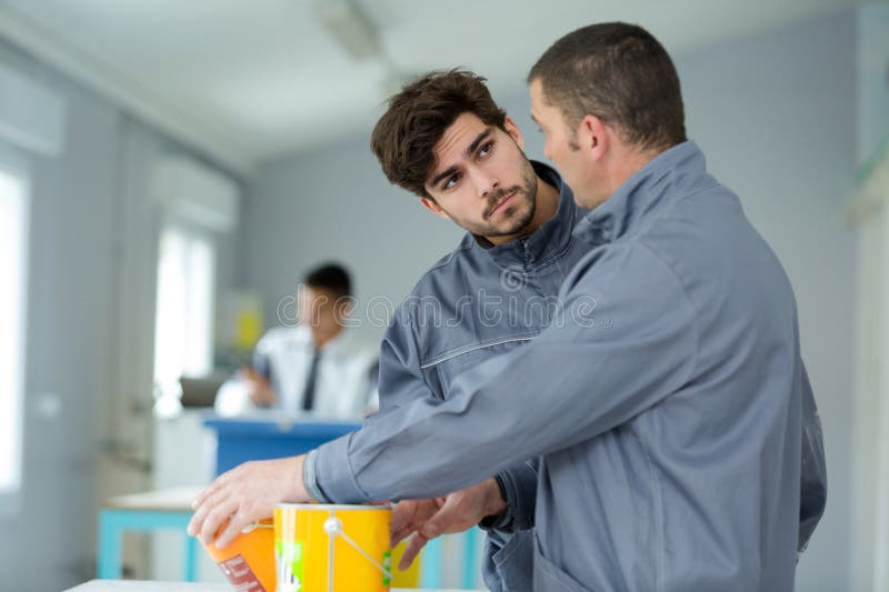 Young Apprentice Painter in Professional Training Stock Image - Image ...