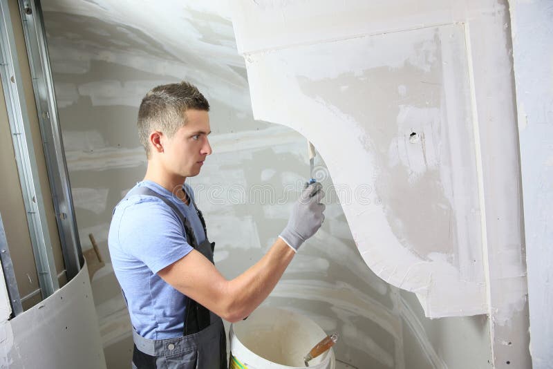 Young Apprentice Plasterer Working Indoors Stock Image - Image of ...