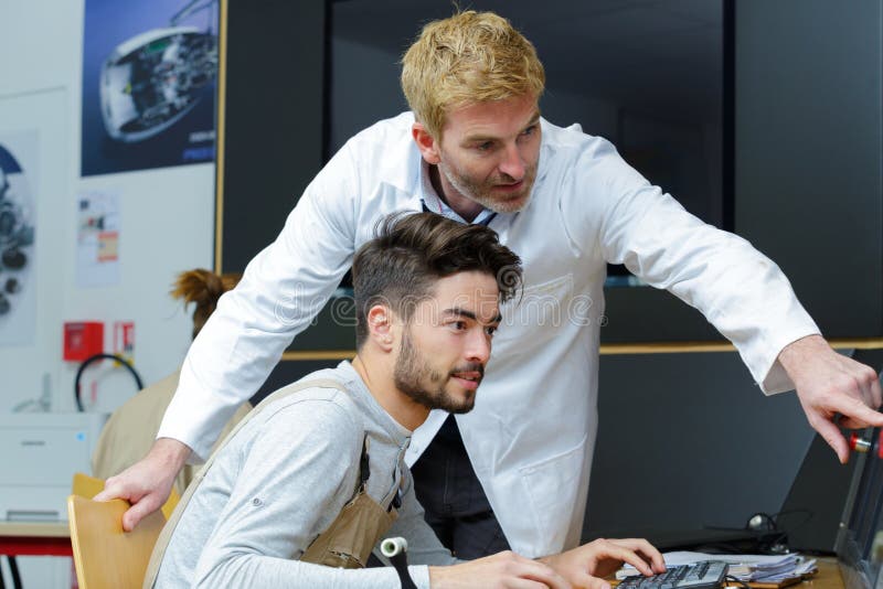 Young Apprentice Using Computer Stock Image - Image of quality ...