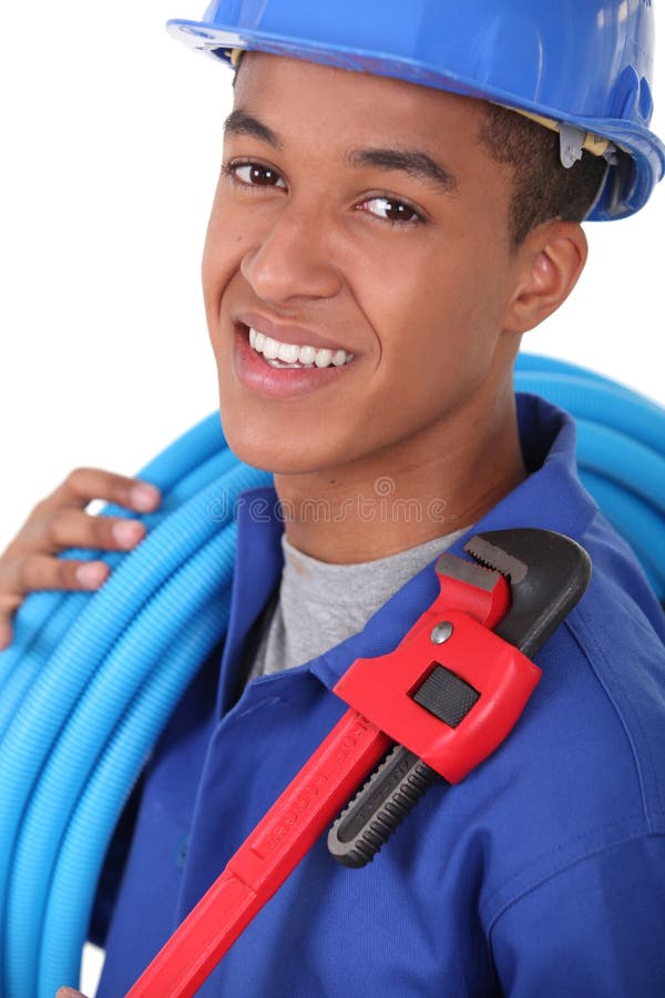 Young Apprentice with Wrench Stock Photo - Image of smiling, adolescent ...