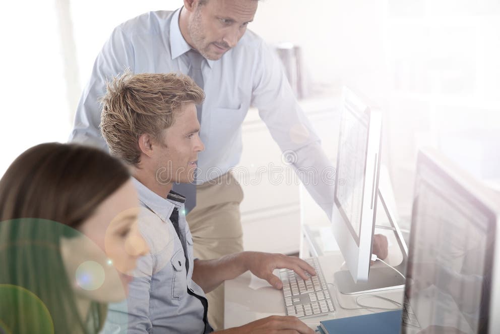 Young Apprentices in Training with Instructor at Office Stock Image ...