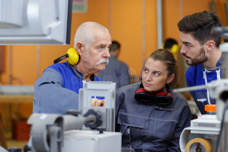 Young Apprentices Mechanics at Work Stock Image - Image of trainee ...