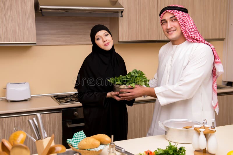 The Young Arab Family in the Kitchen Stock Photo - Image of halal ...