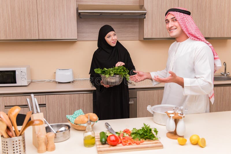 The Young Arab Family in the Kitchen Stock Photo - Image of kitchen ...