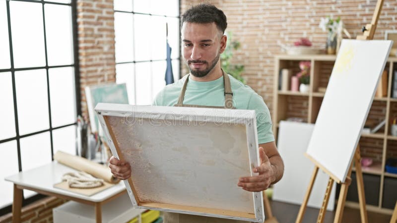Young Arab Man Artist Smiling Confident Looking Draw at Art Studio ...