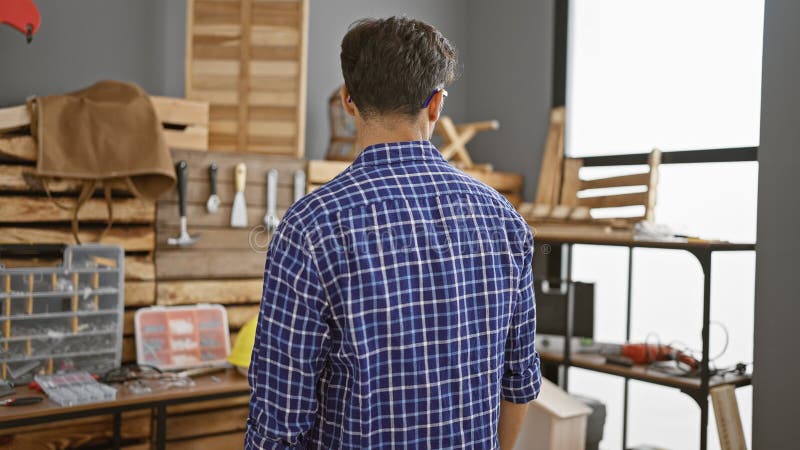 Young Arab Man Carpenter Standing Backwards at Carpentry Stock Photo ...