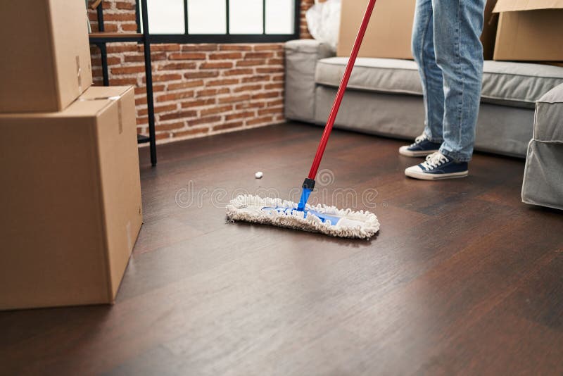 Young Arab Man Cleaning Floor at New Home Stock Image - Image of ...