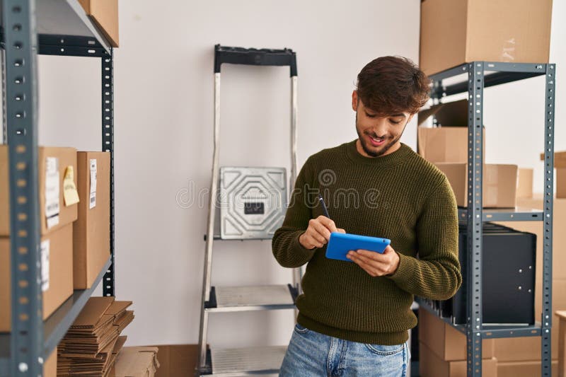 Young Arab Man Ecommerce Business Worker Using Touchpad at Office Stock ...