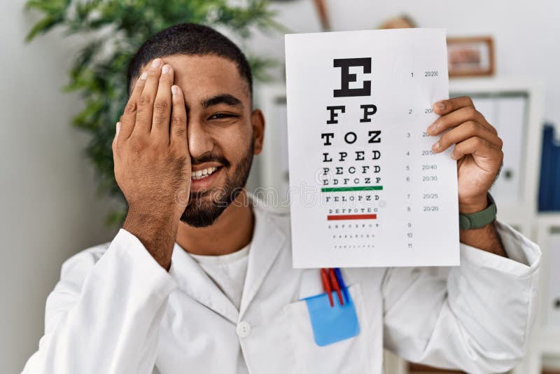 Young Arab Man Holding Sneller Test at Clinic Stock Image - Image of ...