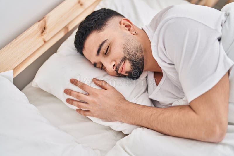 Young Arab Man Lying on Bed Sleeping at Bedroom Stock Image - Image of ...