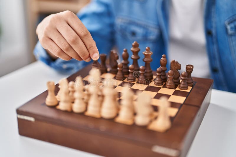 Young Arab Man Playing Chess Sitting on Table at Home Stock Image ...