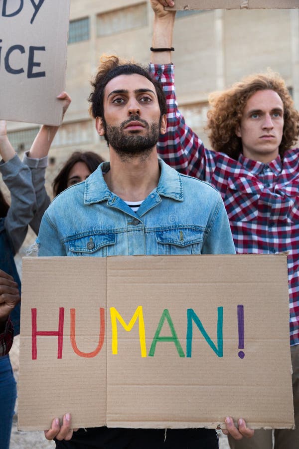 Young Arab Man Protesting on a Demonstration for LGBT Rights Holding ...