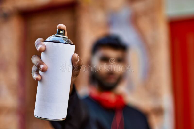 Young Arab Man Relaxed Holding Graffiti Spray at Street Stock Image ...