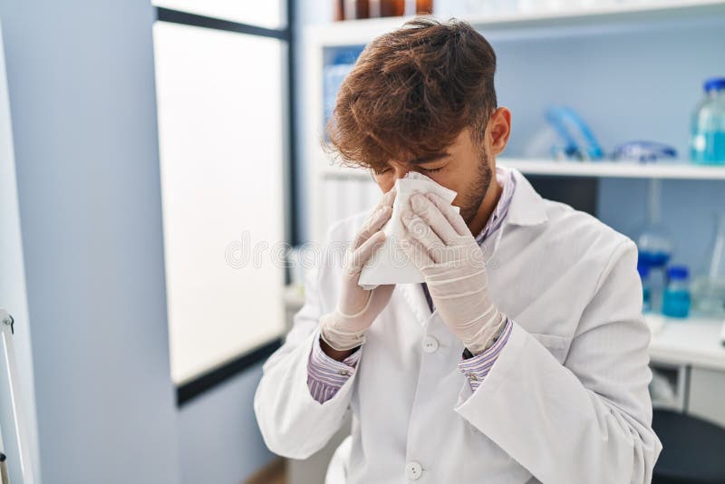 Young Arab Man Scientist Using Napkin at Laboratory Stock Photo - Image ...