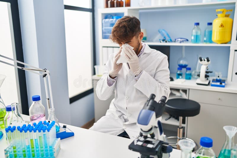 Young Arab Man Scientist Using Napkin at Laboratory Stock Photo - Image ...