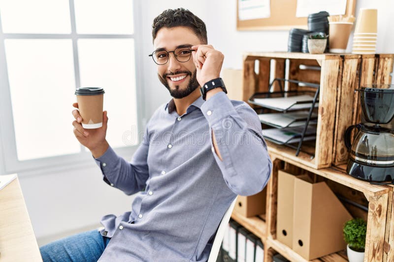 Young Arab Man Smiling Confident Drinking Coffee Working at Office ...