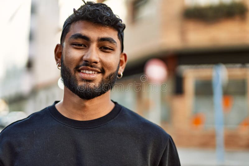 Young Arab Man Smiling Confident Wearing Cap at Street Stock Photo ...