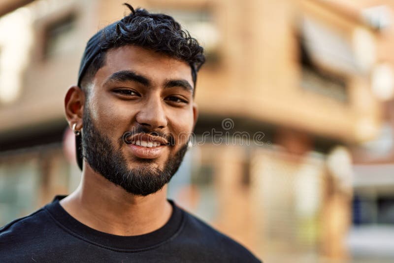 Young Arab Man Smiling Confident Wearing Cap at Street Stock Photo ...
