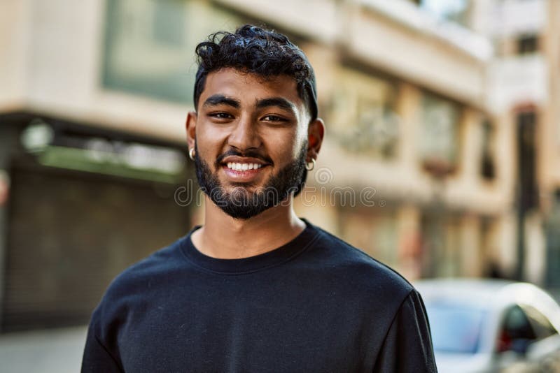 Young Arab Man Smiling Confident Wearing Cap at Street Stock Photo ...