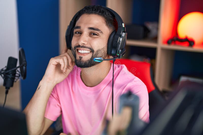 Young Arab Man Streamer Smiling Confident Sitting on Table at Gaming ...