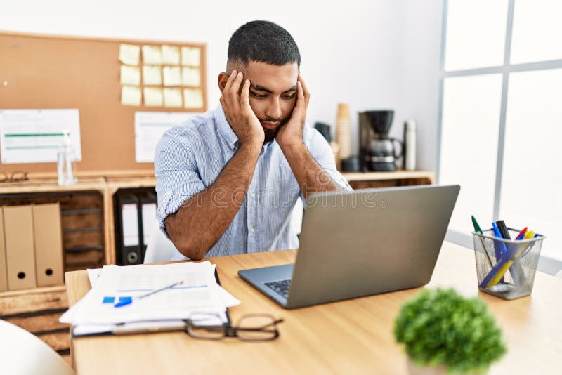 Young Arab Man Stressed Working at Office Stock Photo - Image of hands ...