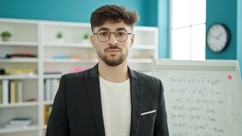 Young Arab Man Student Standing with Relaxed Expression at University ...
