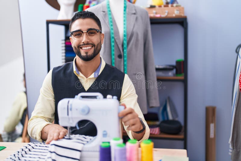 Young Arab Man Tailor Smiling Confident Using Sewing Machine at ...