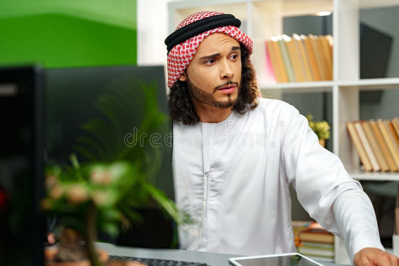 Young Arab Man Traditional Dress Thobe Working Computer Office Stock ...