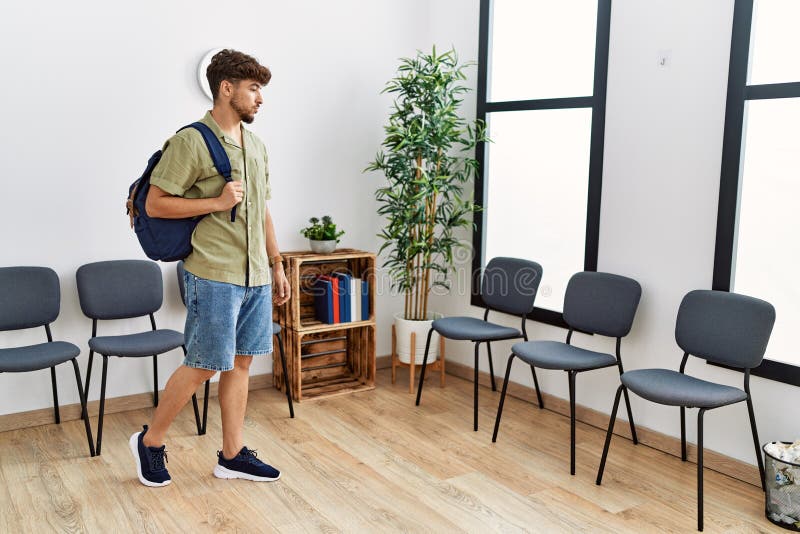Young Arab Man Wearing Backpack Standing at Waiting Room Stock Image ...