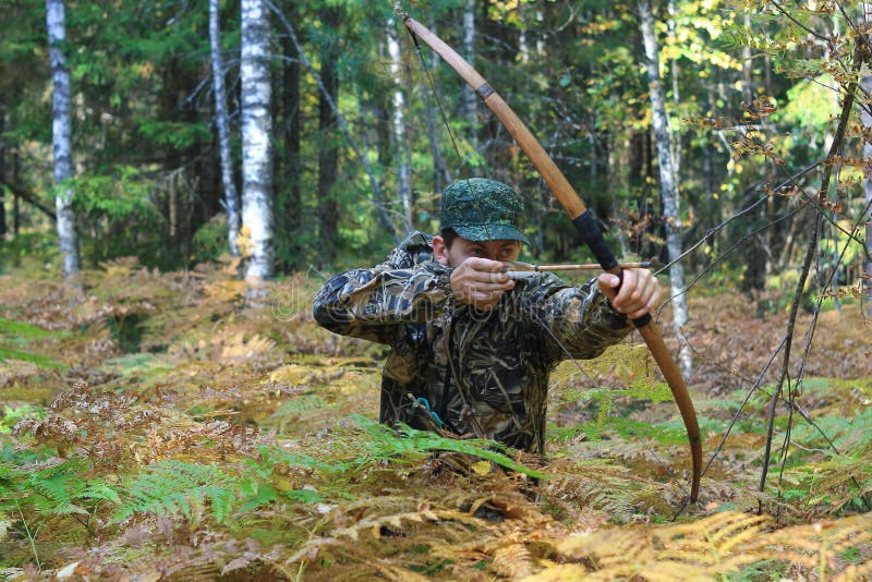 Young archer in forest stock photo. Image of arrows, shooting - 71827126