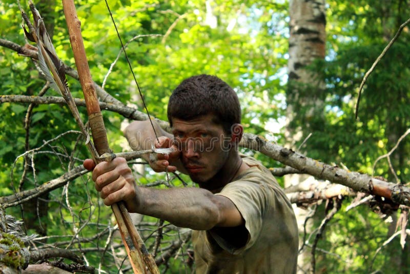 Young archer in forest stock image. Image of target, stone - 71827467