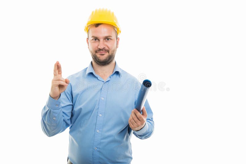 Young Architect Holding Blueprints and Showing Cross Fingers Gesture ... Young Architect Holding Blueprints and Showing Cross Fingers Gesture ...