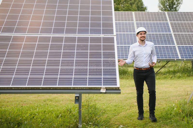 Young Architect Standing by Solar Panels Stock Photo - Image of ...