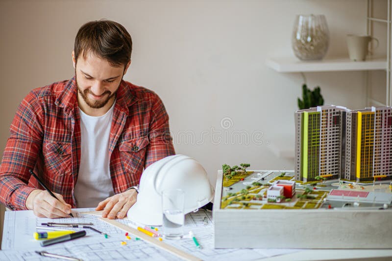 Young Architect Working on an Office Desk Stock Image - Image of ... Young Architect Working on an Office Desk Stock Image - Image of ...
