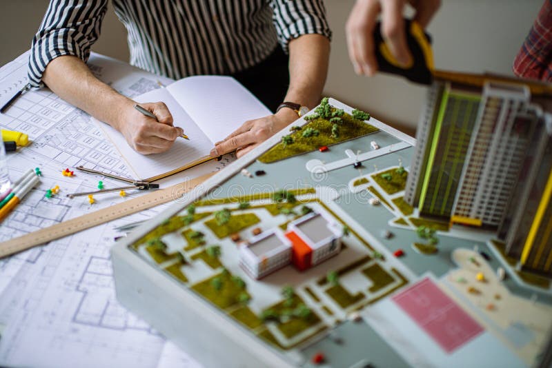 Young Architect Working on an Office Desk Stock Photo - Image of ... Young Architect Working on an Office Desk Stock Photo - Image of ...