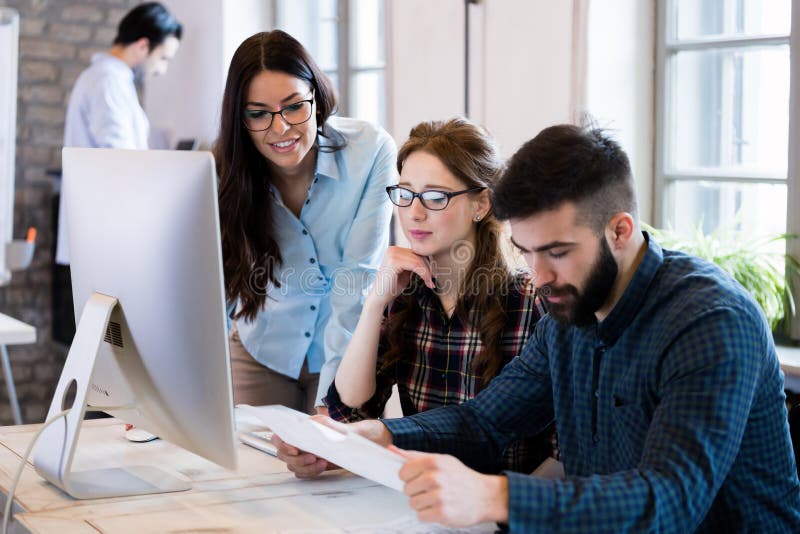 Young Architects Working on Project in Office Stock Photo - Image of ...