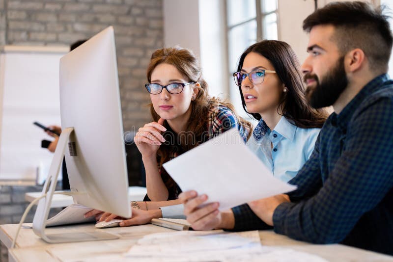 Young Architects Working on Project in Office Stock Photo - Image of ...